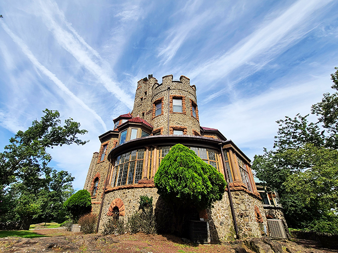 The stone turrets and grand windows of Kip's Castle create a silhouette that would make any medieval monarch do a double-take against New Jersey's blue skies.