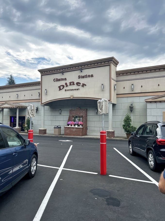 The Clinton Station Diner stands proudly against the New Jersey sky, its classic facade promising comfort food treasures within. No ordinary roadside stop, this is a destination.