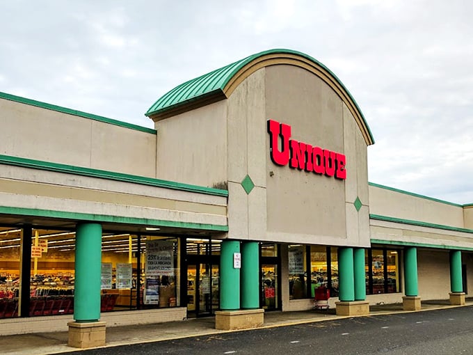 The green-trimmed fa&ccedil;ade with its bold red sign isn't just inviting shoppers &ndash; it's practically daring you to discover what treasures await inside.