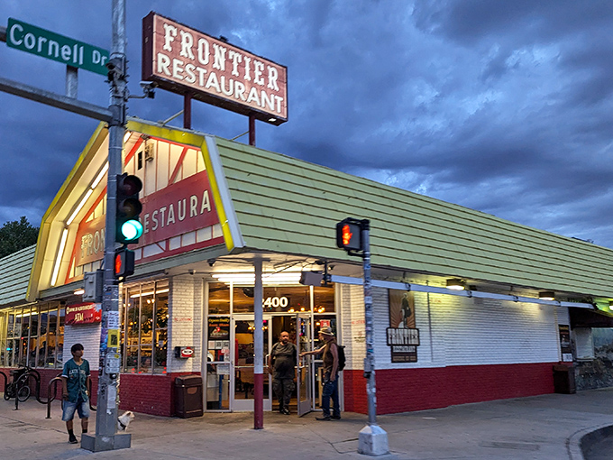 The iconic red and white facade of Frontier Restaurant stands as an Albuquerque landmark, beckoning hungry travelers with promises of New Mexican comfort food.