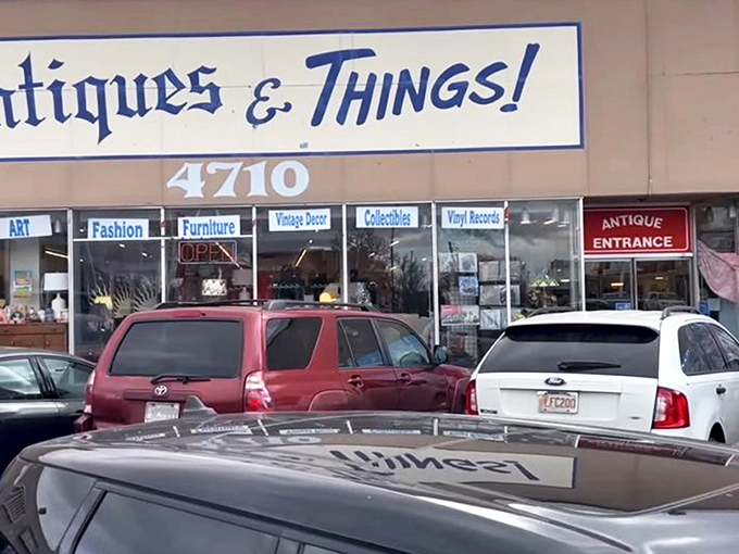 The storefront beckons with promises of treasures within, its blue lettering against beige like a desert sky invitation to explore.