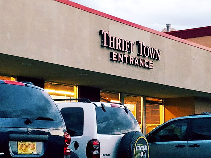 The iconic Thrift Town storefront beckons treasure hunters with its bold red signage, promising adventures that last longer than most Netflix binges.