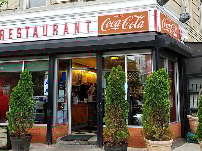 That classic corner storefront isn't just architectural eye candy&mdash;it's a beacon of breakfast hope on Washington Avenue, promising pancake nirvana inside.