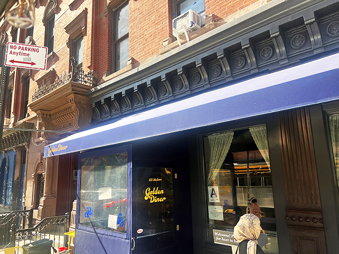 The royal blue awning of Golden Diner stands out like a beacon of breakfast hope on this unassuming Chinatown corner.