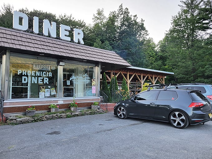 The unassuming roadside exterior belies culinary magic within. Those white "DINER" letters on the roof are like a beacon for hungry travelers in the Catskills.