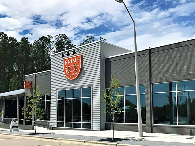The modern facade of Prime Barbecue stands like a beacon of hope for hungry travelers, promising smoky delights within its contemporary walls.