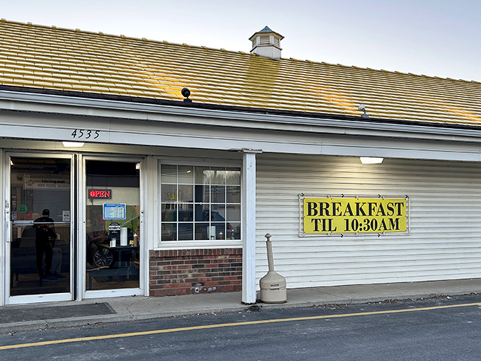 The unassuming exterior of culinary greatness. That yellow "BREAKFAST TIL 10:30AM" sign might as well read "Life-Changing Chicken Beyond This Point."