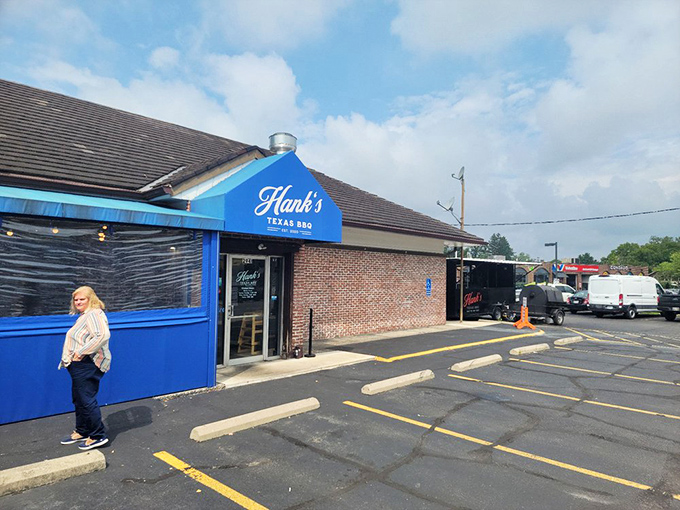 The blue awning of Hank's Texas BBQ beckons like a smoke signal to hungry Columbus residents. BBQ paradise hides in plain sight.