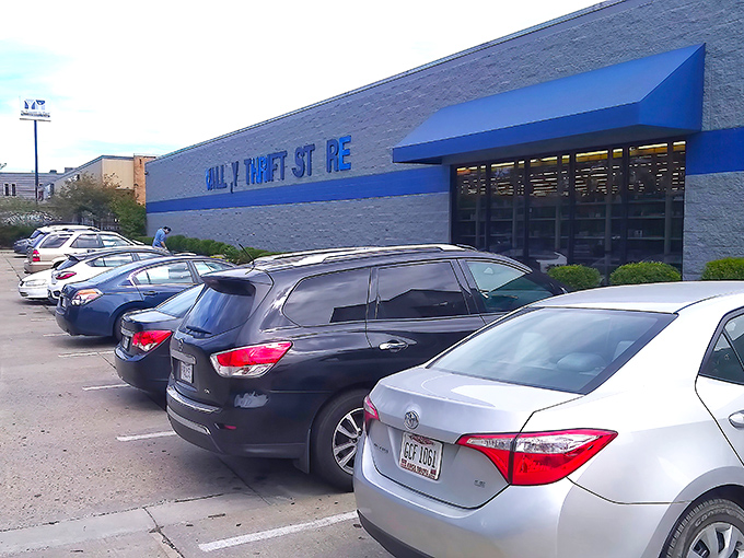 The blue-trimmed exterior of Valley Thrift Store stands like a beacon of bargain possibilities, promising treasure hunts that begin the moment you park your car.