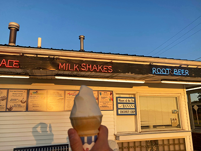The white clapboard shrine to frozen happiness stands proudly in Akron, beckoning custard pilgrims from miles around with its classic Americana charm.