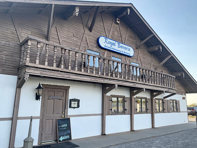 Bavaria meets Oklahoma in this charming Alpine-style exterior. The white stucco and dark wooden beams promise authentic German delights within.