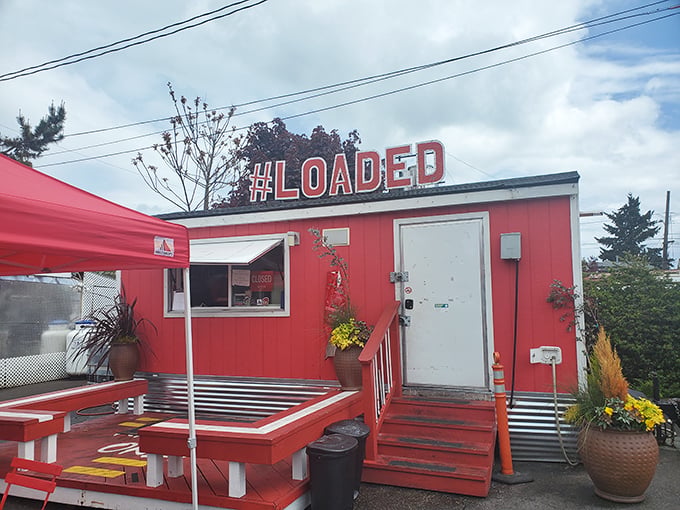 The bright red food cart with "#LOADED" emblazoned on top isn't just a name&mdash;it's a promise that's gloriously kept with every order.