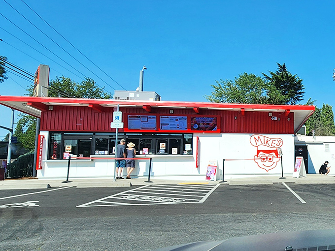 The iconic red exterior of Mike's Drive-In stands as a beacon of burger bliss in Milwaukie, promising nostalgic flavors that never go out of style.