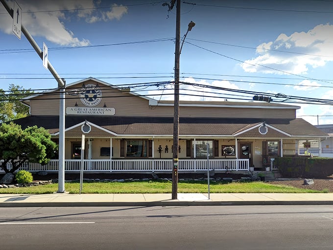 The Western frontier meets Pennsylvania charm at Dodge City's inviting exterior. That wide front porch practically whispers, "Come on in, partner, your steak awaits." 