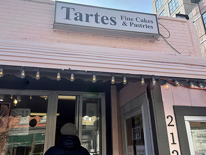 The pink façade of Tartes isn't just a building—it's a beacon of buttery hope on Arch Street for dessert lovers everywhere.