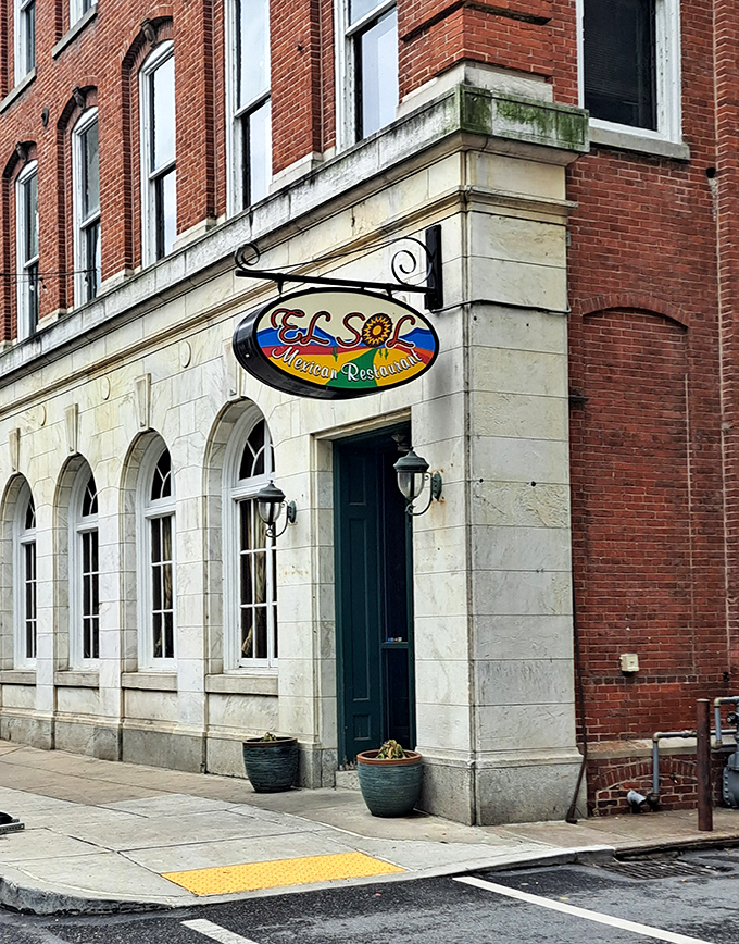 El Sol's modest storefront belies the culinary treasures within. Those string lights aren't just decoration&mdash;they're beacons guiding hungry souls to enchilada nirvana.