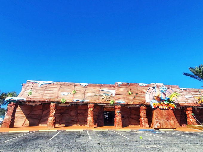 The exterior of DinoLand Cafe looks like Fred Flintstone's architect got a degree and went upscale. Those faux rock walls practically scream "prehistoric fine dining!"