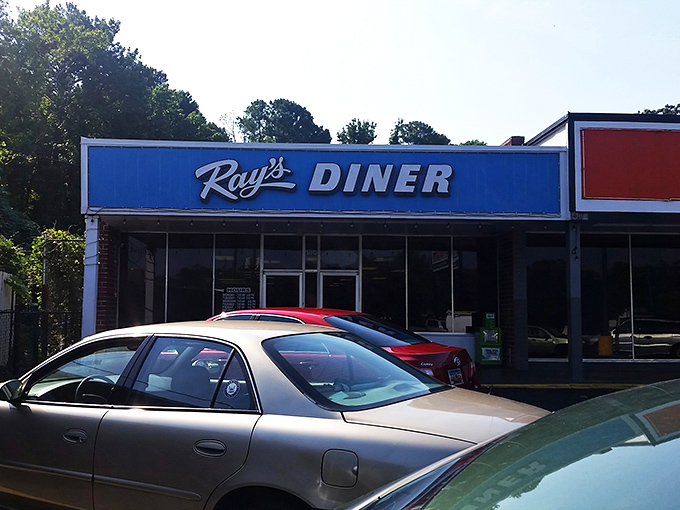 The iconic blue sign of Ray's Diner stands as a beacon of breakfast hope on Two Notch Road in Columbia.