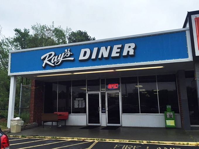 The iconic blue sign of Ray's Diner stands as a beacon of breakfast hope on Two Notch Road in Columbia.