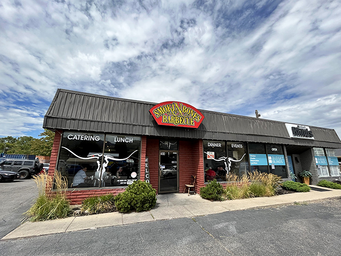 The unassuming exterior of Smokin Bones BBQ stands like a beacon of hope for hungry travelers, promising smoky delights within those brick walls. 