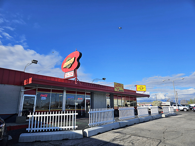 Ogie's bright yellow sign beckons hungry travelers like a breakfast lighthouse in West Valley City's sea of strip malls.