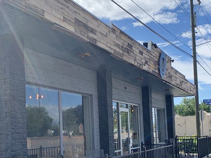 The unassuming exterior of Weller's Bistro proves once again that culinary treasures often hide behind modest facades. That wooden accent though? Pure rustic charm.