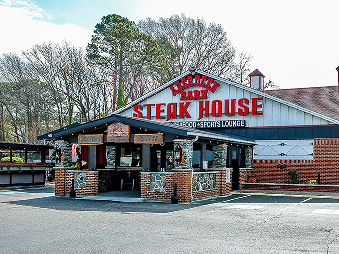 The iconic red lettering of Aberdeen Barn beckons like a lighthouse for hungry souls. This barn-shaped beacon has been guiding steak lovers to beefy bliss for generations.