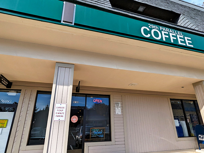 The unassuming storefront hides coffee greatness like a superhero's secret identity. Green signage and simple exterior belie the caffeinated magic happening inside.