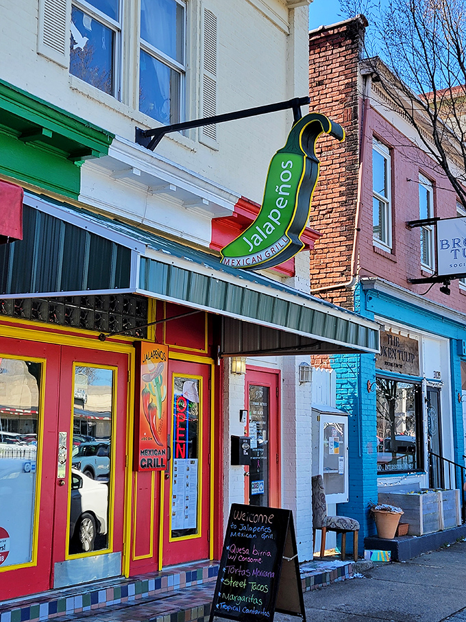 The modest red storefront screams "culinary destination," waving you in for a fiesta of flavors.
