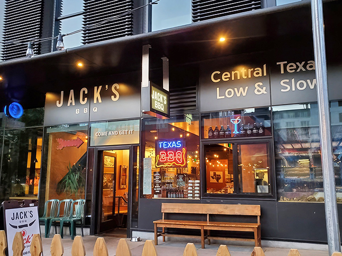 The warm wood-paneled interior of Jack's BBQ creates a cozy Texas oasis in the heart of Seattle's tech hub.