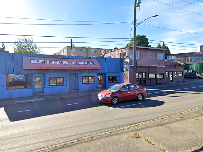 The unmistakable bright blue exterior with cherry-red awning says it all: culinary treasures don't always hide in fancy packages.