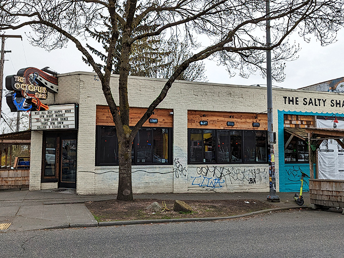 The white brick facade of The Octopus Bar might seem unassuming, but that blue cephalopod sign promises an evening of maritime mischief awaits inside.