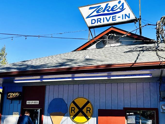 Simplicity at its finest: The iconic blue and white Zeke's sign beckons hungry travelers like a lighthouse for those navigating the sea of Highway 2 hunger pangs.