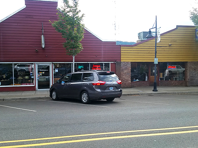 The wagon wheel above the storefront isn't just decoration&mdash;it's a time machine invitation to step back into a world where treasures await.