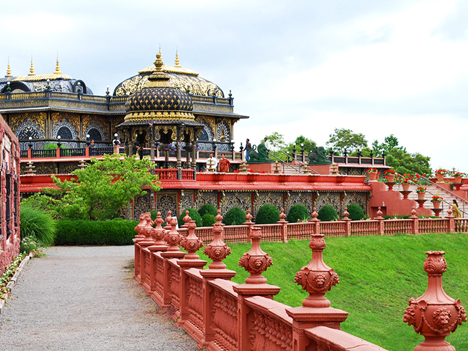 The golden domes of Prabhupada's Palace catch the sunlight like jewelry against West Virginia's blue skies. Who ordered a slice of India with their mountain views?