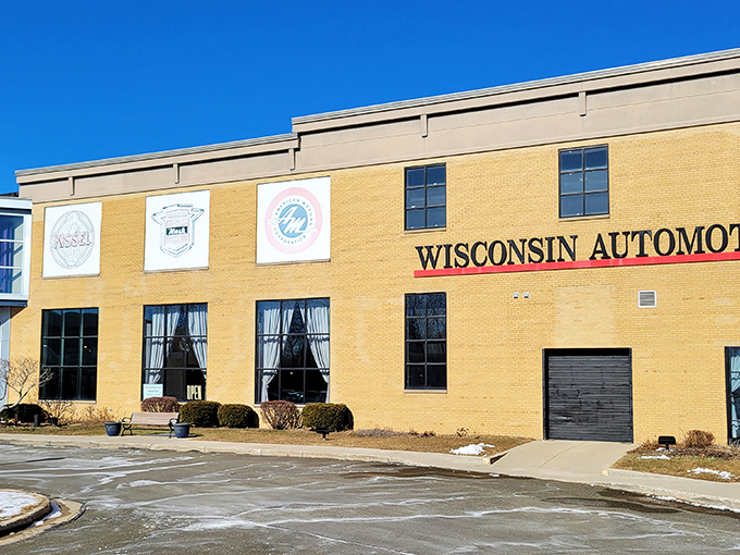 The Wisconsin Automotive Museum's exterior proudly displays its automotive heritage with vintage car logos. Like finding a treasure chest of chrome and nostalgia in Hartford's backyard.