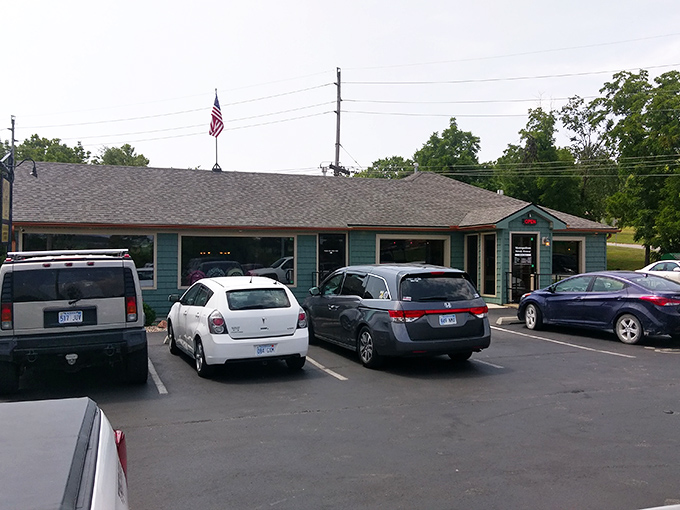 The little blue steakhouse with the big wooden sign says it all: "The Little Steak House Across From The Big House." Unpretentious perfection awaits.