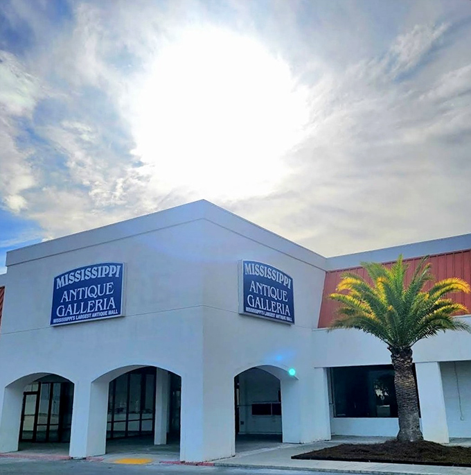 The classic car parked outside isn't just decoration&mdash;it's a time machine preview of the wonders waiting inside Mississippi Antique Galleria. 