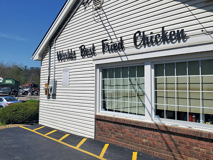 The unassuming exterior of culinary greatness. That yellow "BREAKFAST TIL 10:30AM" sign might as well read "Life-Changing Chicken Beyond This Point."