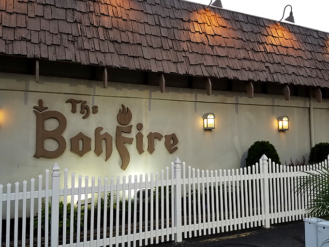 The iconic Bonfire sign beckons hungry travelers like a lighthouse for seafood lovers on Ocean City's Coastal Highway.