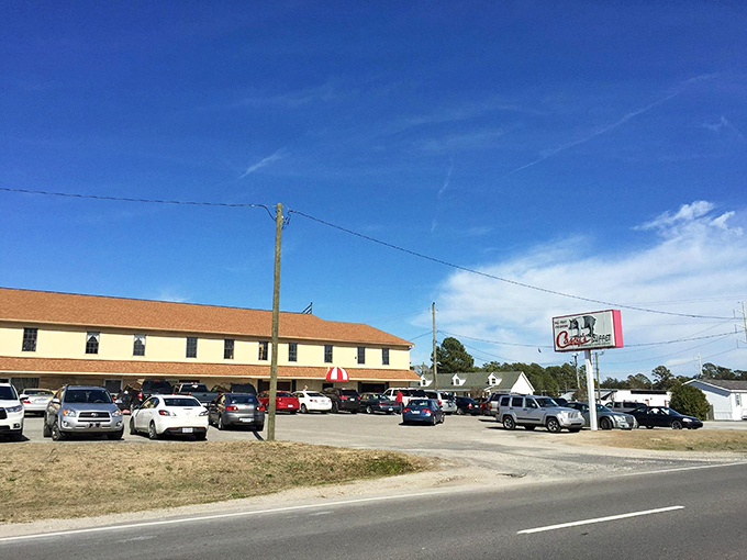 The unassuming exterior of Casey's Buffet proves the age-old wisdom: never judge a Southern feast by its fa&ccedil;ade. This Wilmington institution promises comfort within those walls.