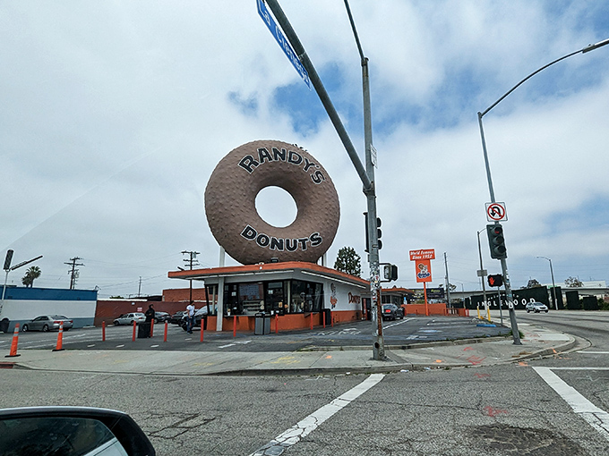 The iconic giant donut sign at Randy's isn't just a landmark&mdash;it's a beacon of hope for those suffering from acute pastry deficiency. 