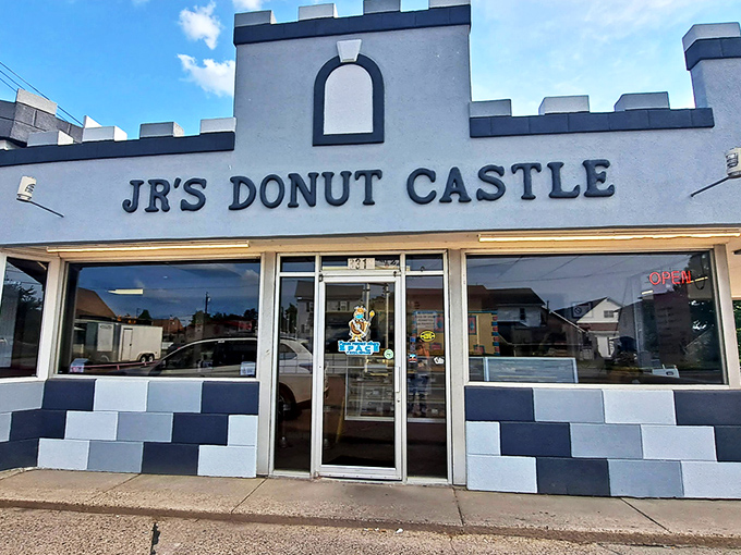 Not all castles have moats and dragons. This one defends against hunger with a fortress of fried dough and a blue-gray fa&ccedil;ade that says "royalty of the breakfast realm."