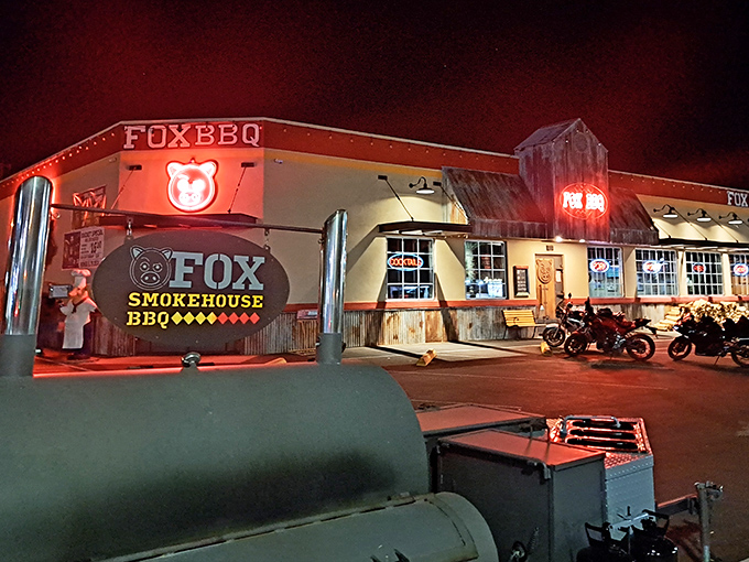 That neon pig sign isn't just decoration&mdash;it's a beacon of hope for the barbecue-deprived, glowing like a meaty North Star in Boulder City's night sky.