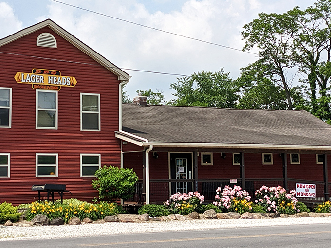 The red farmhouse beckons like a BBQ lighthouse on the Ohio horizon. Flower beds and rustic charm promise smoky delights within.