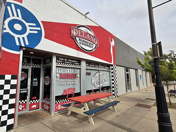 The red, white, and blue exterior isn't subtle, but neither is the barbecue inside. Kansas pride meets smoky perfection at this Wichita landmark.