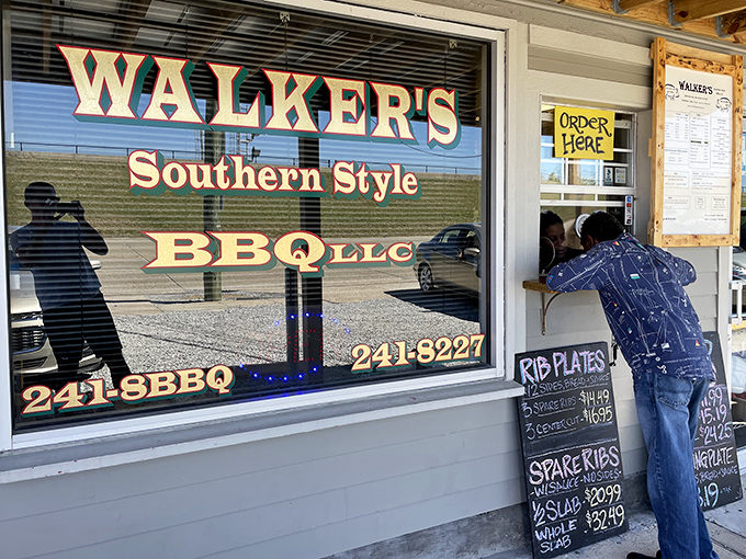 Walker's BBQ stands like a smoke-scented beacon of hope for hungry travelers. That massive smoker isn't just equipment&mdash;it's a declaration of serious barbecue intentions.
