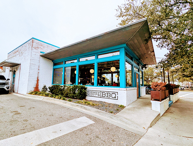 The unmistakable white brick and turquoise trim of barbecue paradise. Rodney Scott's exterior promises the smoky delights waiting inside.