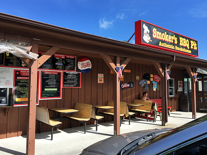 The humble wooden exterior of Smoker's BBQ Pit belies the flavor explosion waiting inside. Beach vacations need this kind of unpretentious barbecue sanctuary.