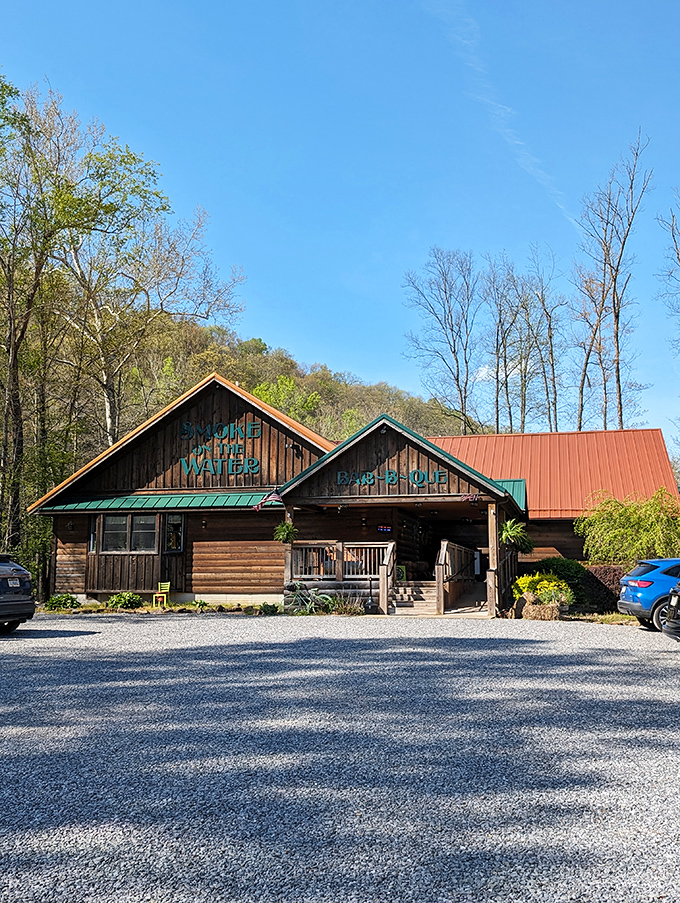 The rustic cabin exterior of Smoke on the Water beckons like a barbecue beacon in the West Virginia hills. That aroma you're smelling? Worth the drive alone.
